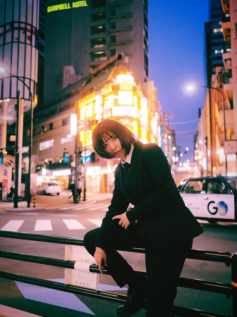 Black suit. | GANREF