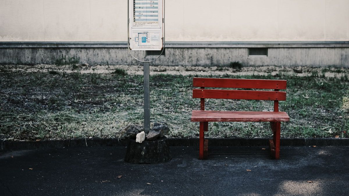 at the bus stop. | GANREF